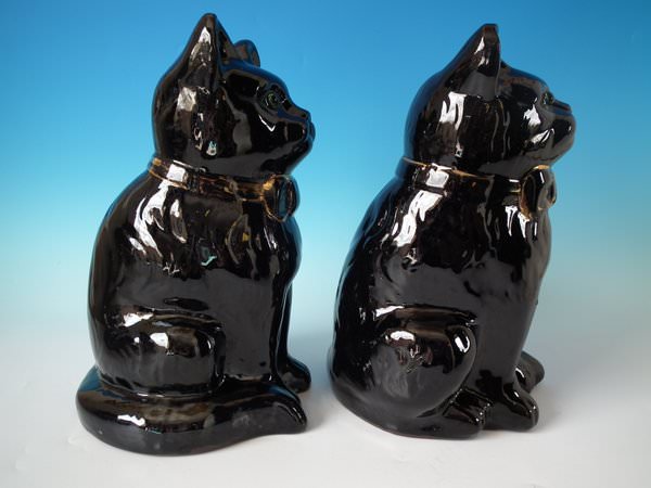 Pair Staffordshire Pottery cats, Jackfield black with glass eyes